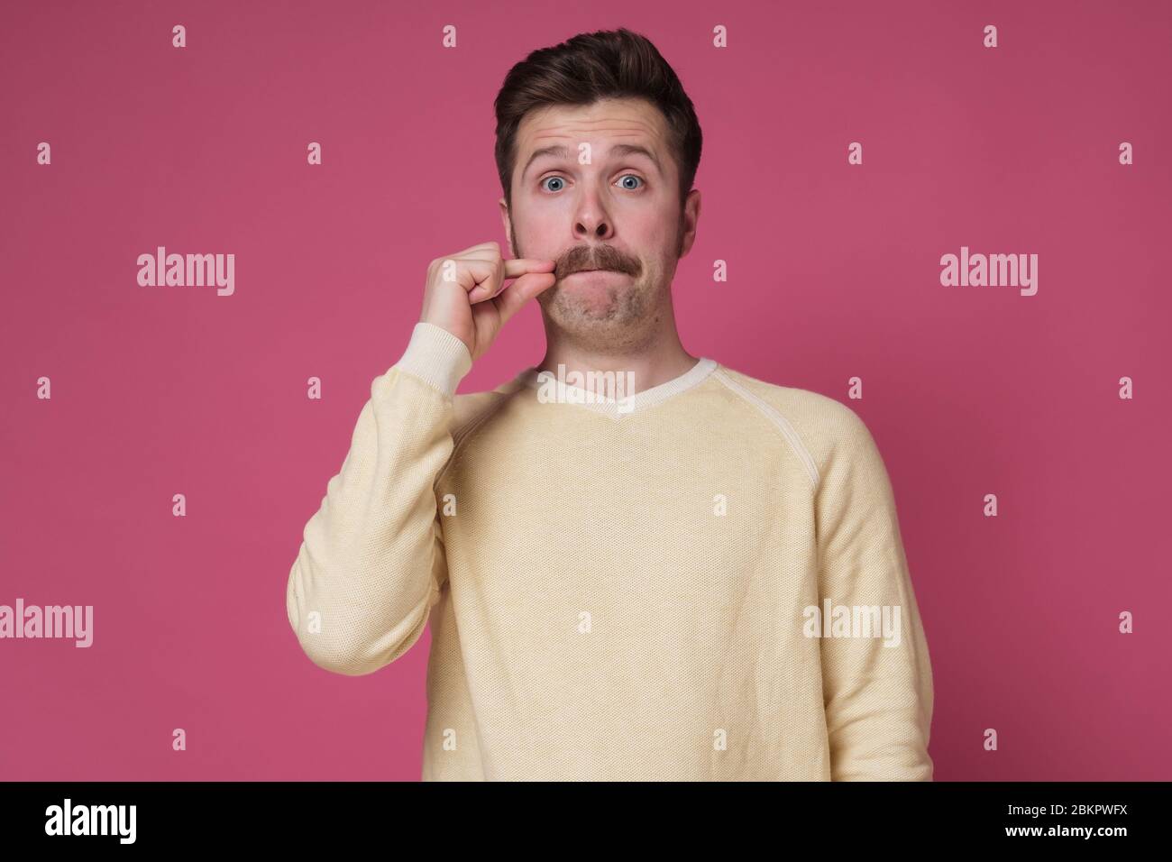 Man zip mouth hi-res stock photography and images - Alamy