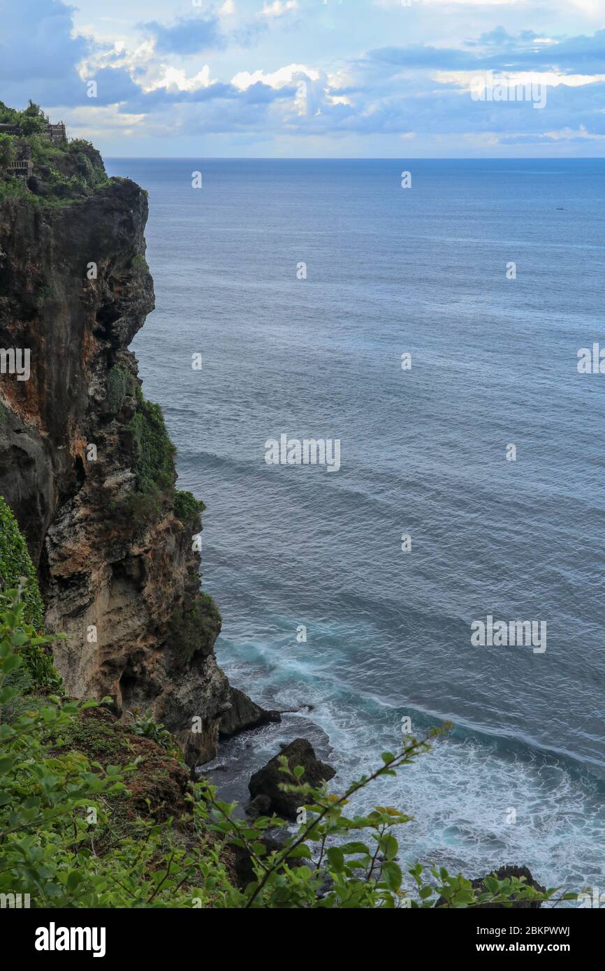 Overview panorama ocean shore, cliff. Sunset. Bali. Overwhelmed scene ...
