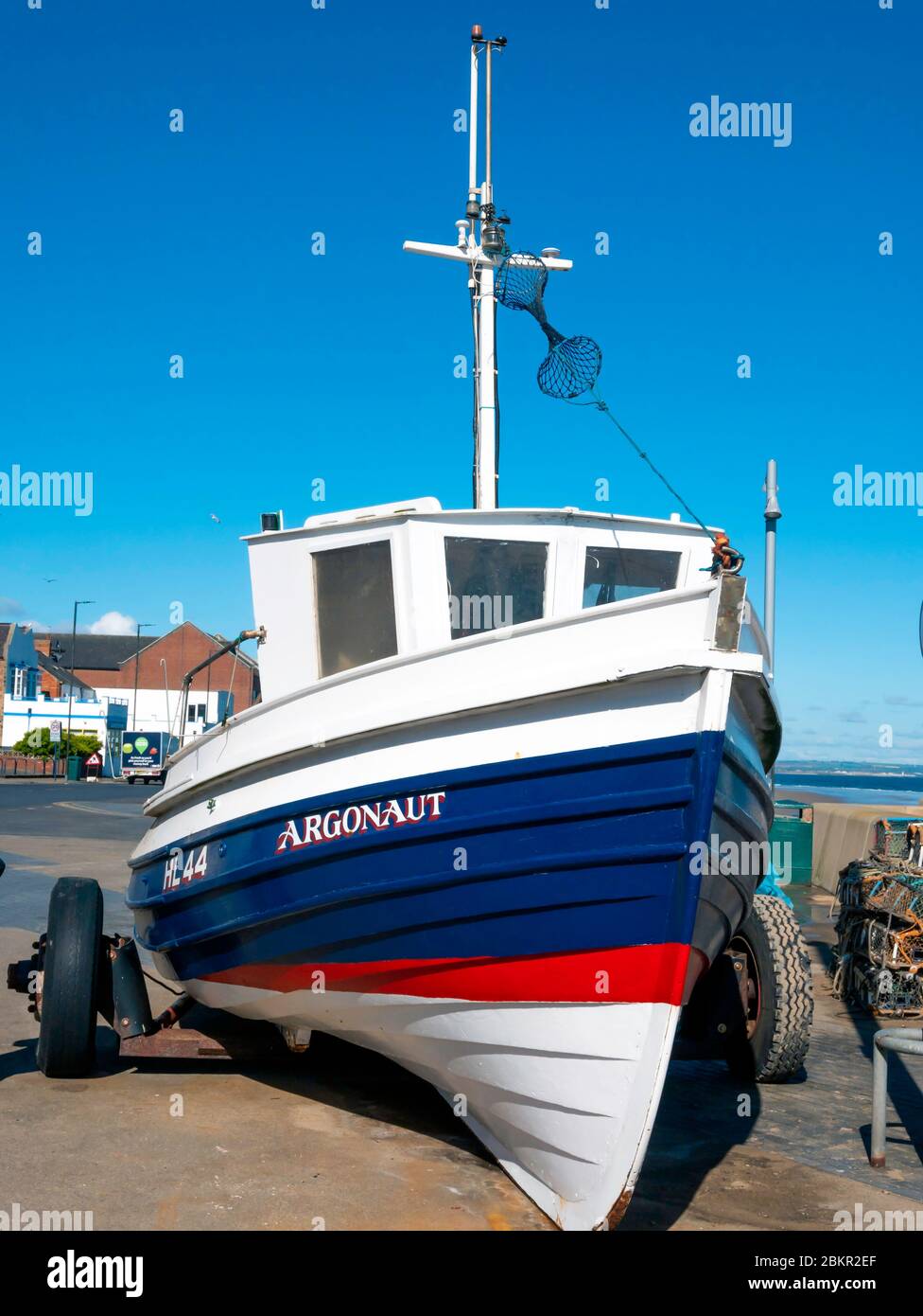 Argonaut a small inshore fishing boat with its launching tractor on ...