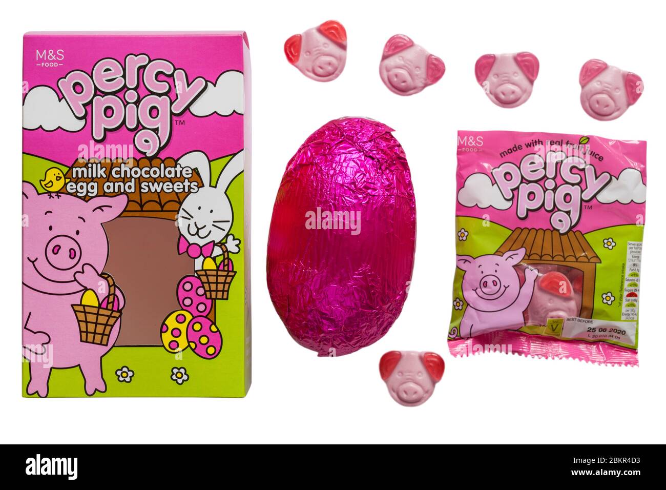 M&S Percy Pig milk chocolate egg and Percy Pig sweets removed from box isolated on white ...