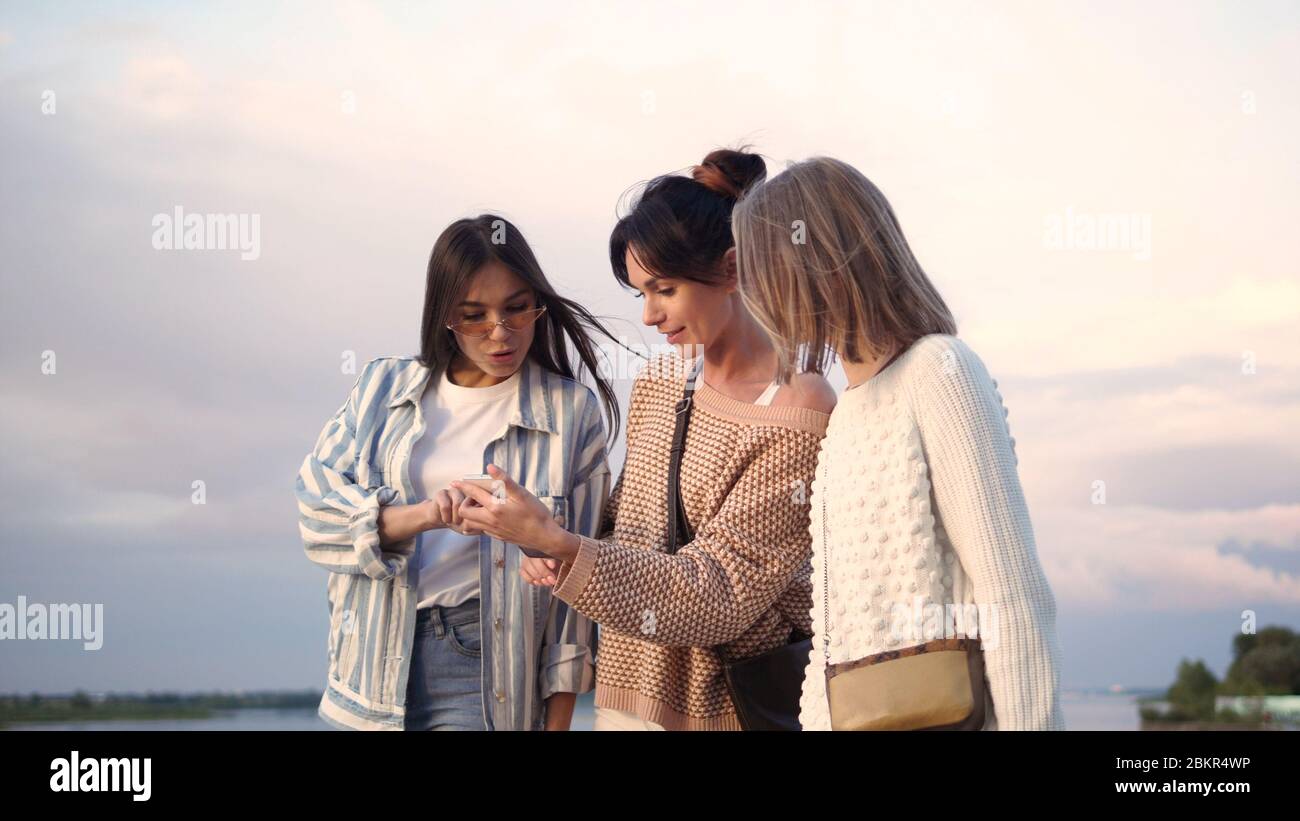 Young women using voice recognition search function on the smart Stock ...