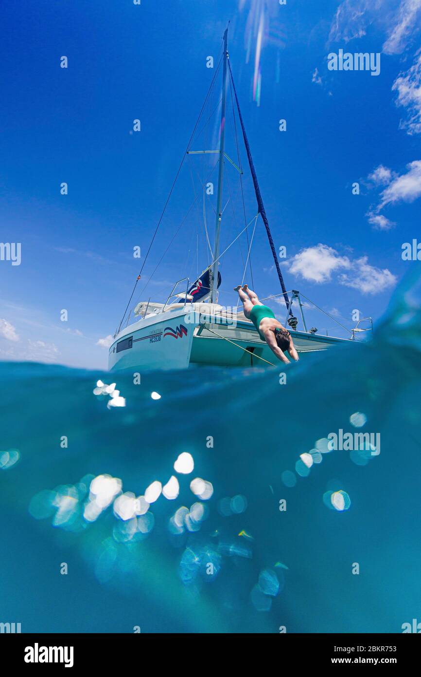 Woman diving into water hi-res stock photography and images - Alamy