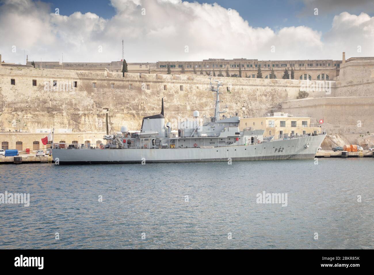 small battleship in the harbour in malta Stock Photo - Alamy