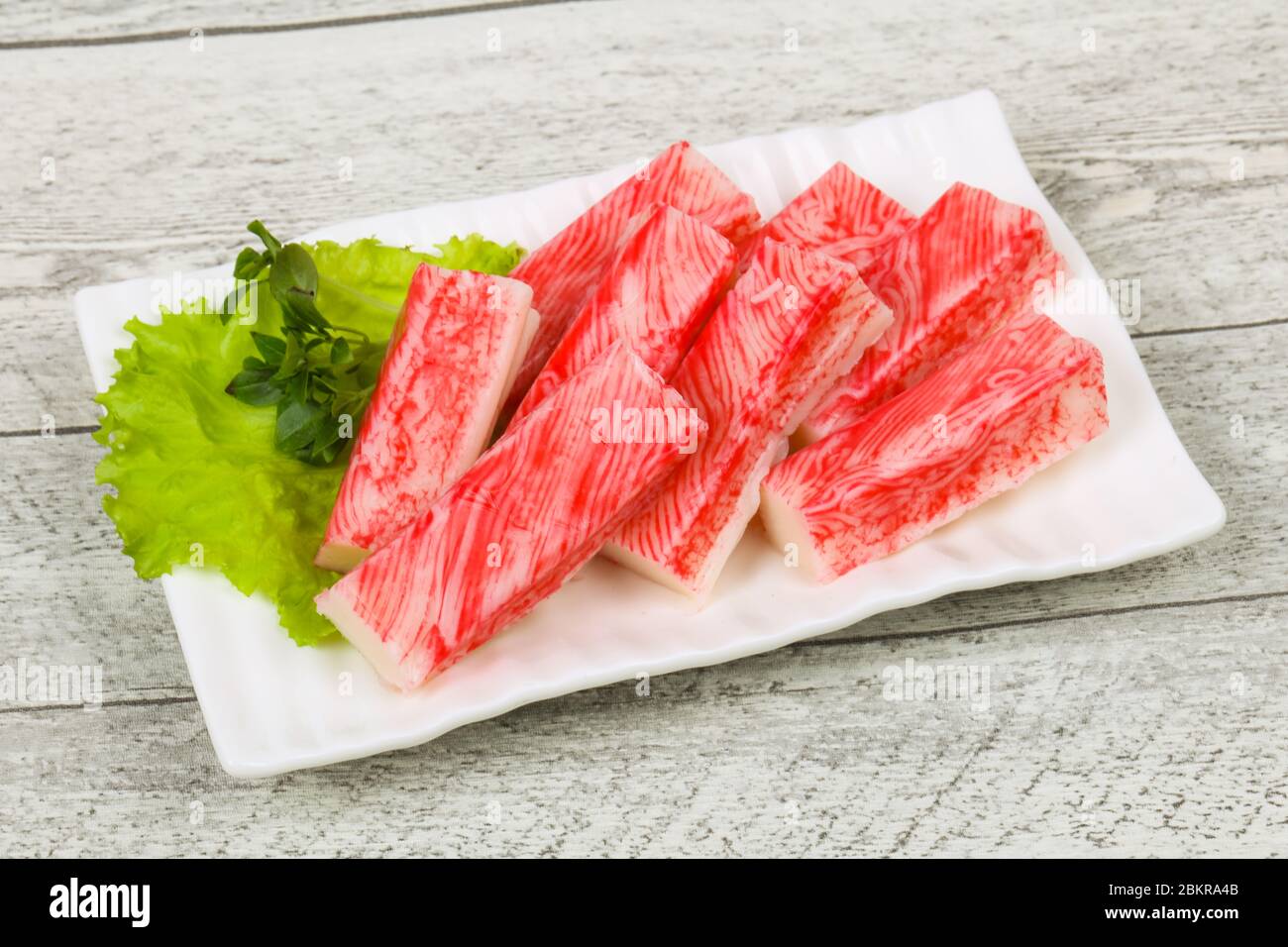 Crab surimi stick served salad leaves Stock Photo - Alamy