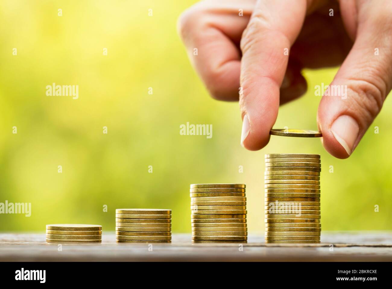 Business success concept - gold money coins Stock Photo - Alamy