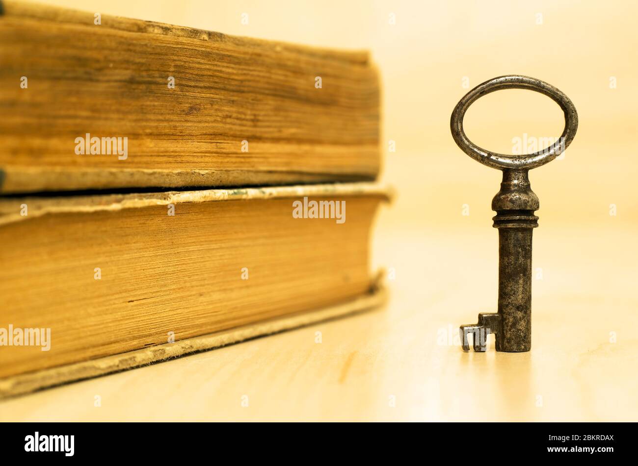 Key and books - life coaching and motivation concept Stock Photo - Alamy