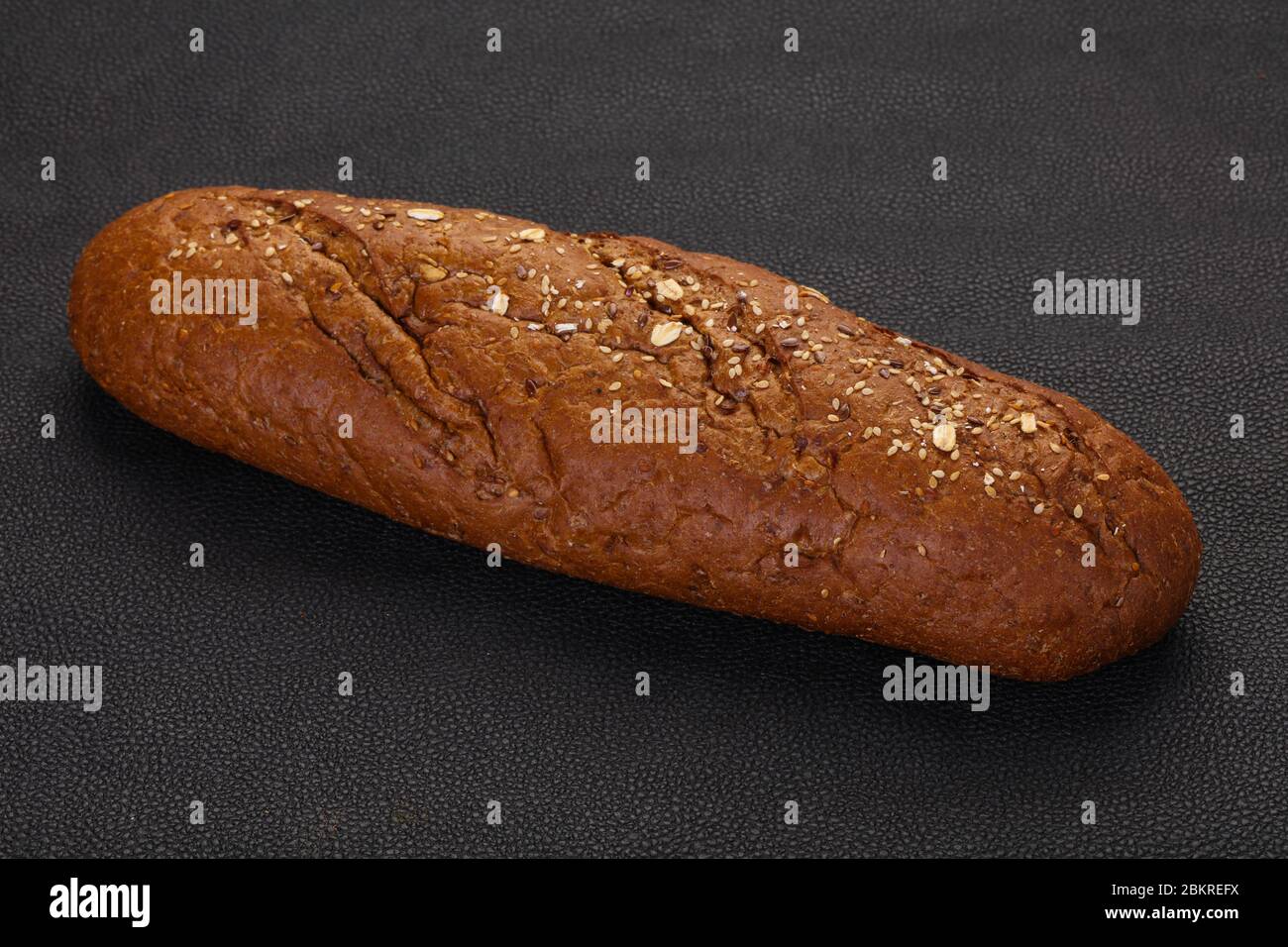 Crust hot Black loaf bread Stock Photo - Alamy