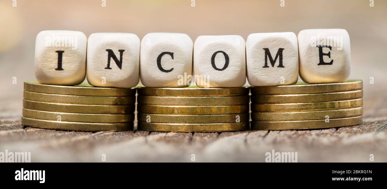 Income, profit concept with letters and money coins - web banner idea ...