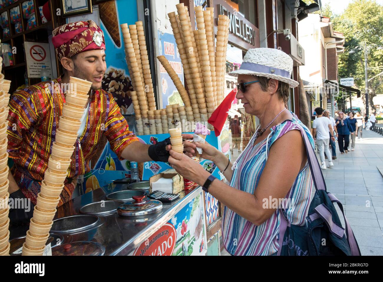 Turkey, Istanbul, ice cream vendors perform a show to give the cone to ...
