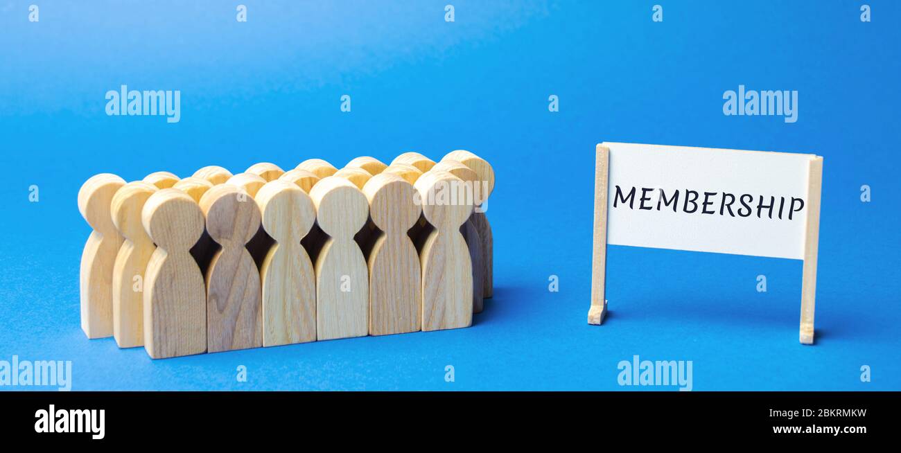 Team of workers and a poster with the word membership. Belonging of ...