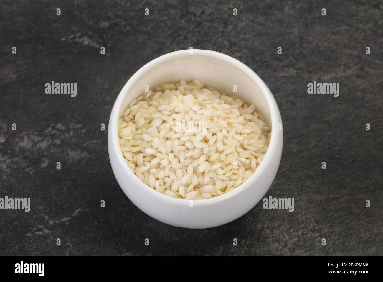 Raw Arborio rice for Italian risotto Stock Photo - Alamy