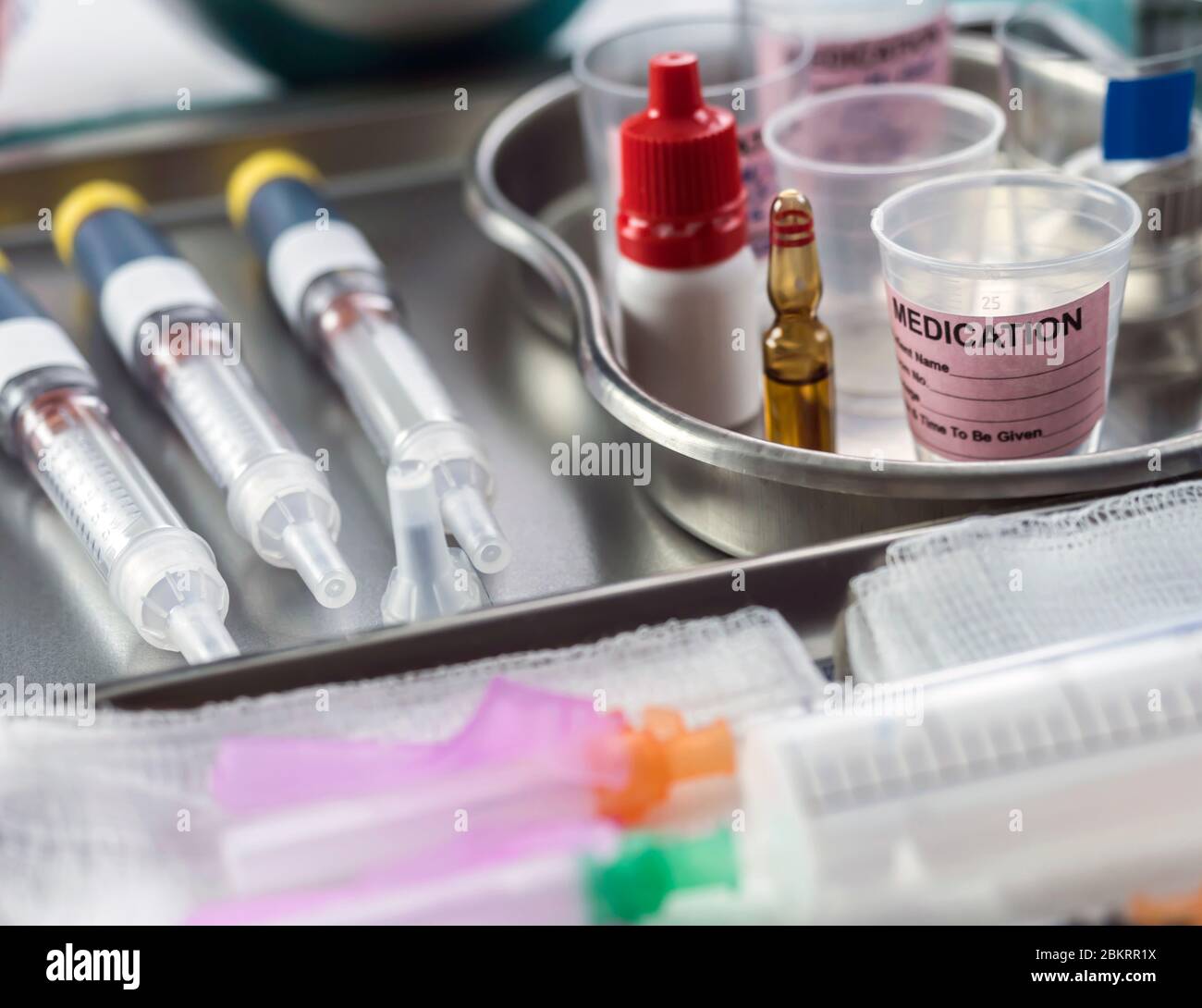 Diverse medication in glasses monodose along with insulin injectors in ...