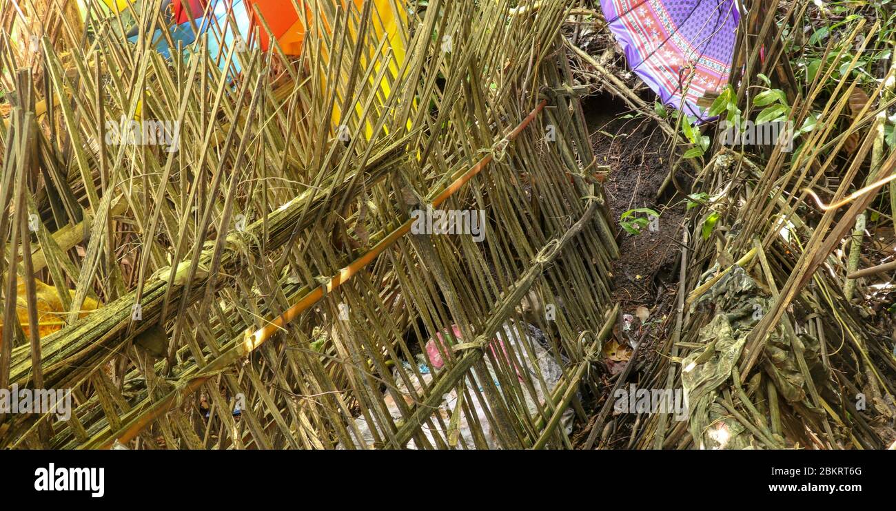 Grave of bamboo sticks in a cemetery in Terunyan village. Traditional ...