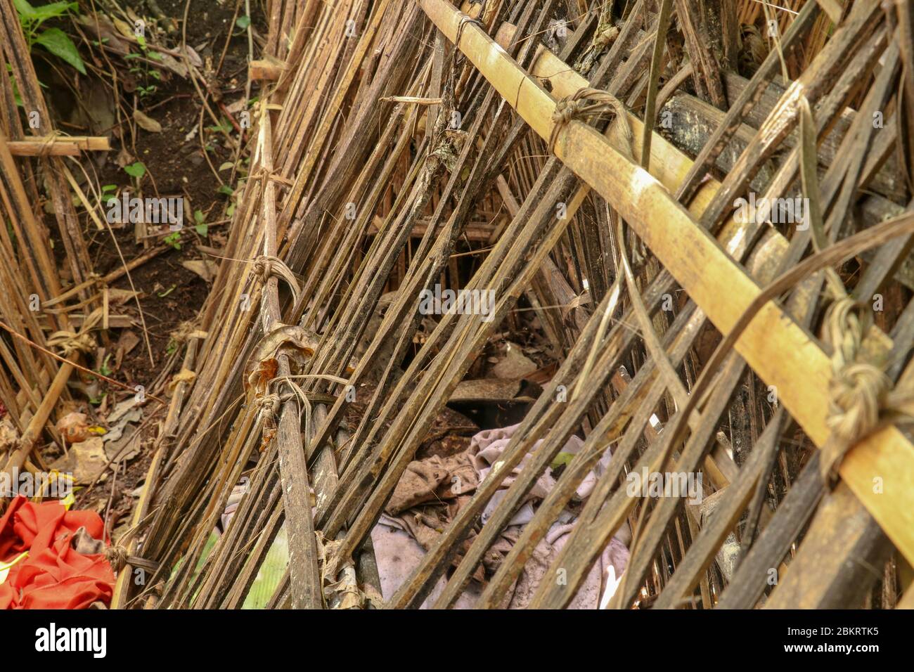 Grave of bamboo sticks in cemetery in Terunyan village. Traditional ...