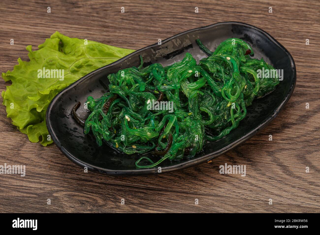 Green Chuka Seaweed Salad Isolated on White Background Top View. Wakame Sea Kelp Salat, Chukka ...