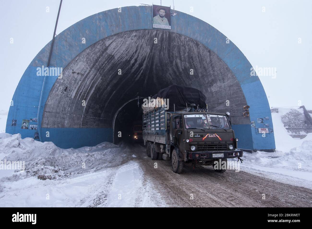 Salang Pass, Afghanistan - January 2015: Trucks pass through the Salang ...