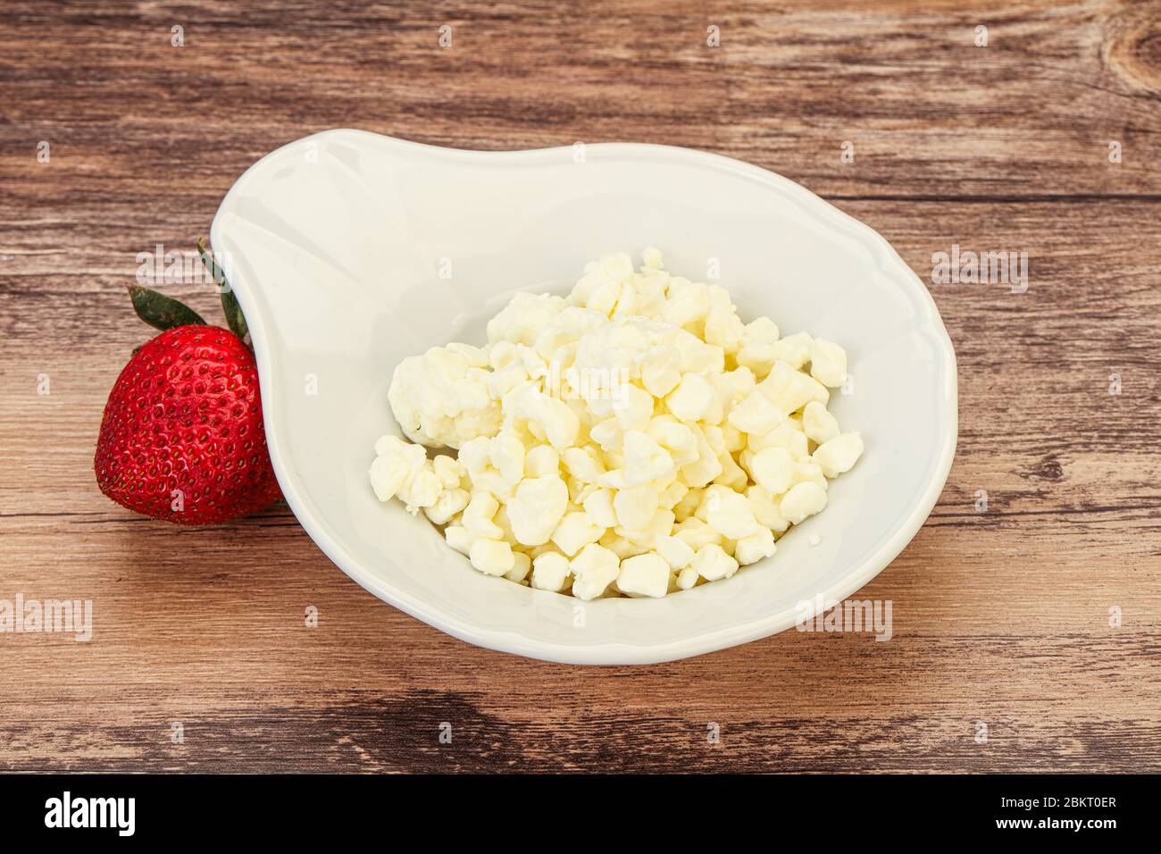Dietary food - grain cottage cheese in the bowl Stock Photo - Alamy