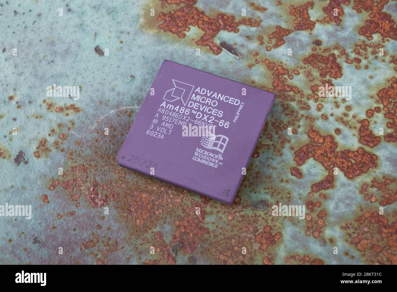 KYIV, UKRAINE - April 22, 2020. AMD 486DX2-66 processor on rusty ...