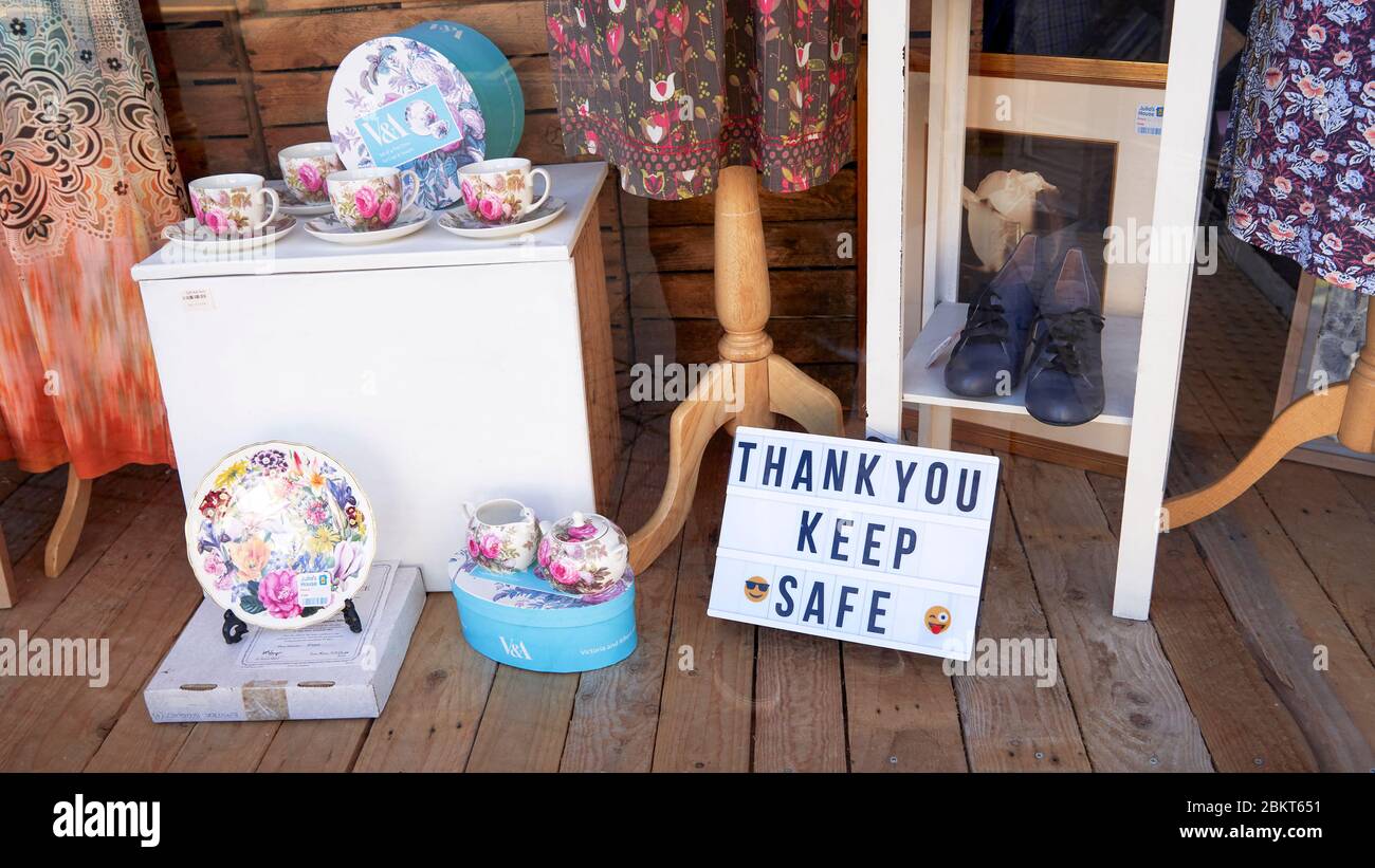 Thank you keep safe message with emojis in shop window Stock Photo - Alamy