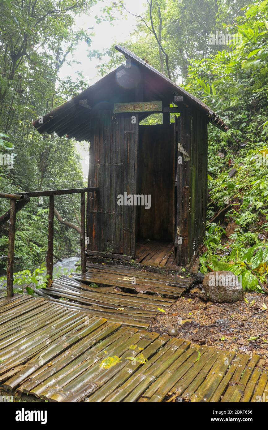 Wooden cabin with changing rooms in tropical jungle, near Spray ...