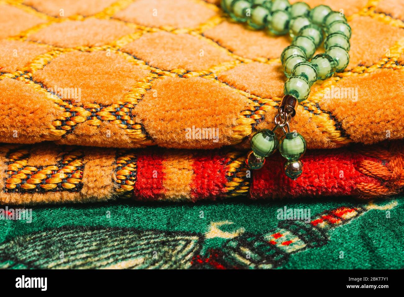 Islamic prayer beads oriental texture close up on praying mat Arabic ...