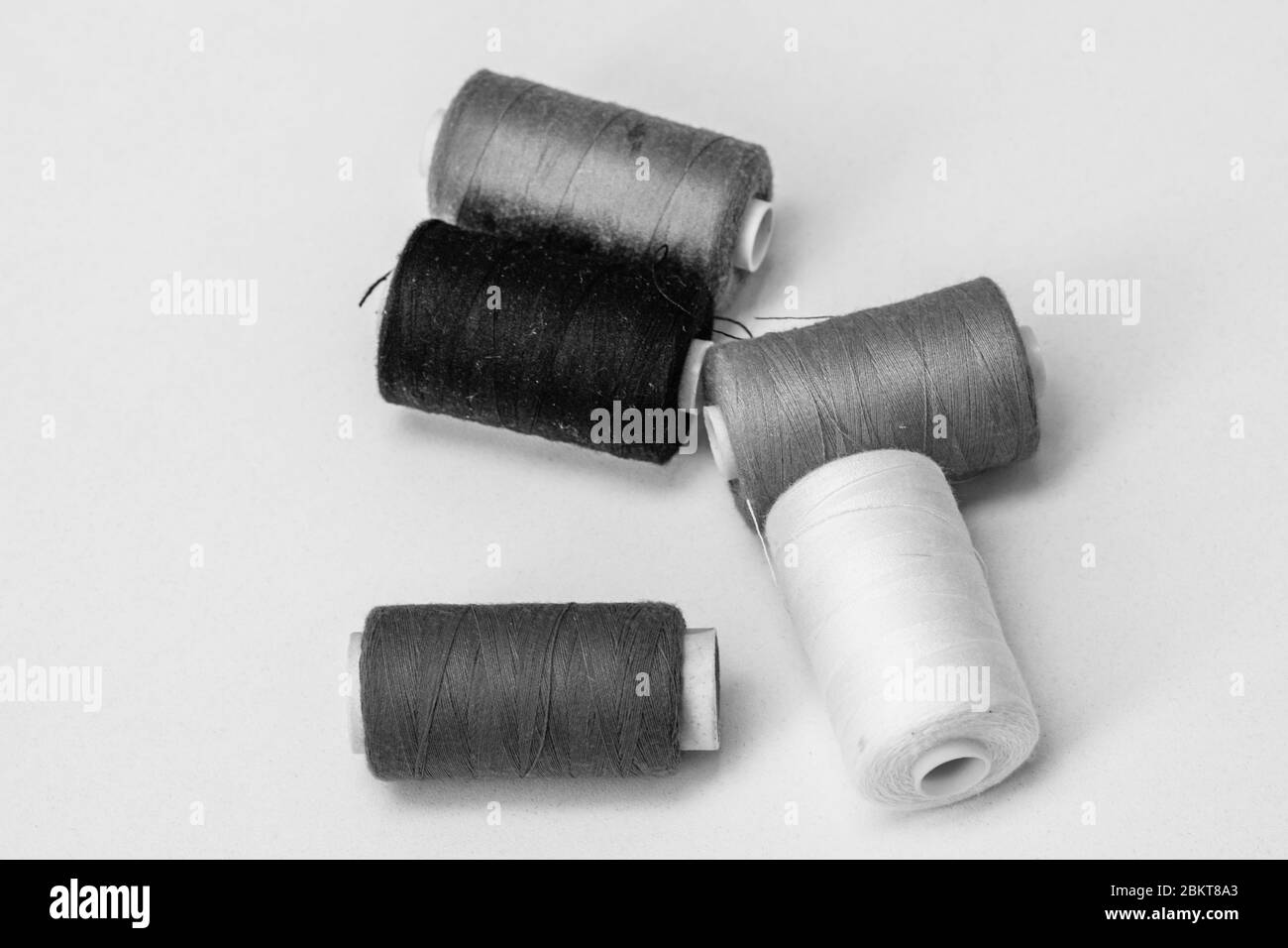 Sewing needle in fabric Black and White Stock Photos & Images - Alamy