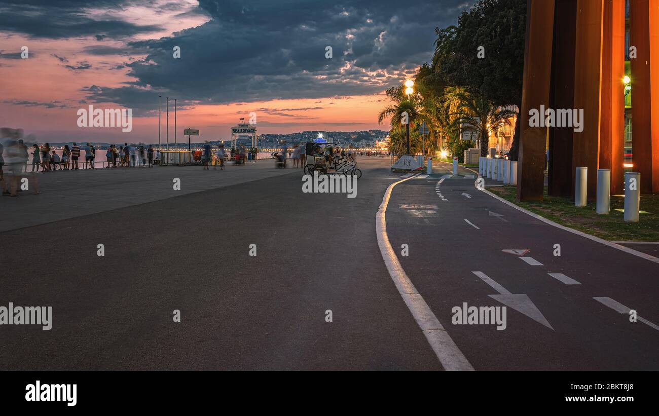 Nice, France, September 30, 2018: People enjoy a nice summer evening ...