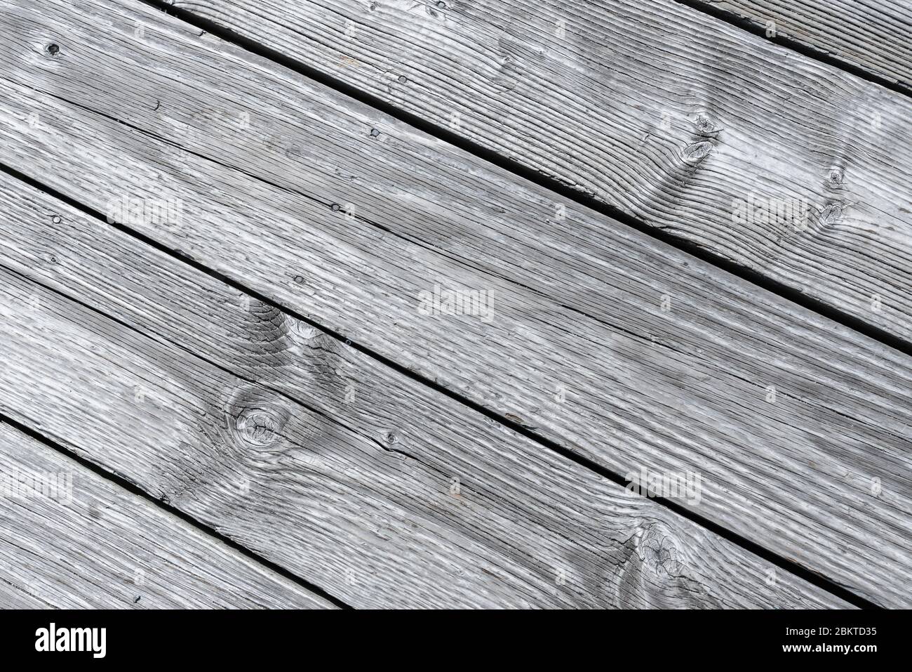 Close-up of rustic textured gray wood planks in diagonal rows Stock ...