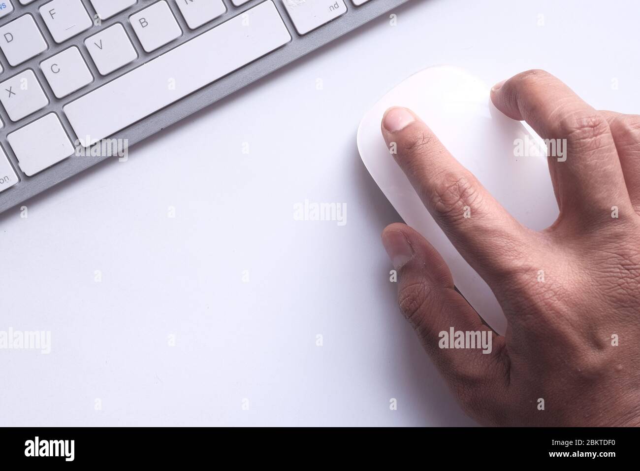 person hand use computer mouse on desk Stock Photo - Alamy