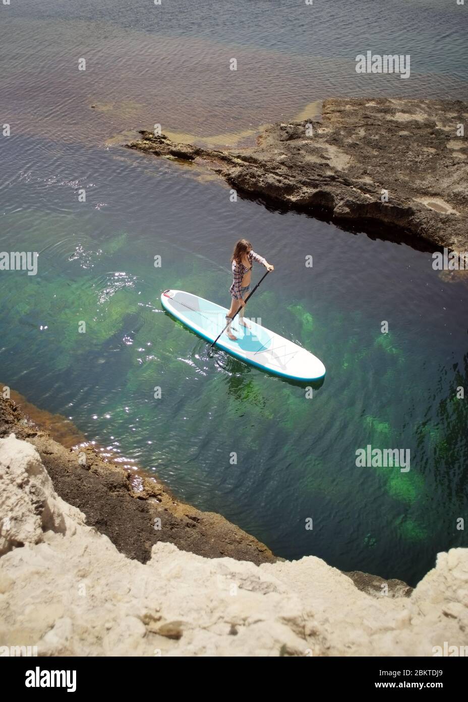Woman silhouette on sup hi-res stock photography and images - Alamy