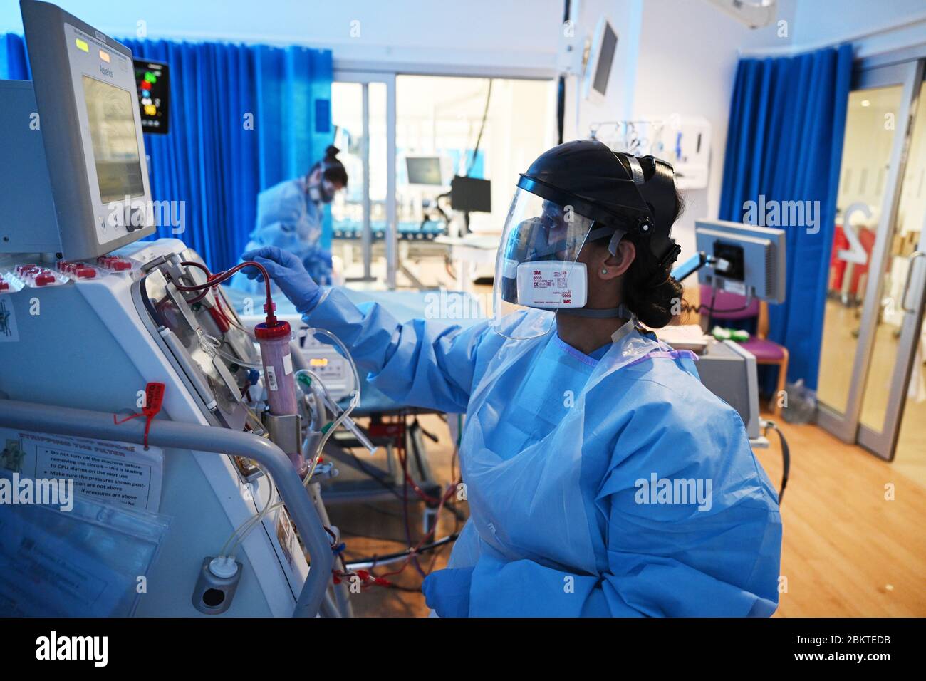 Clinical staff wear Personal Protective Equipment (PPE) as they care ...