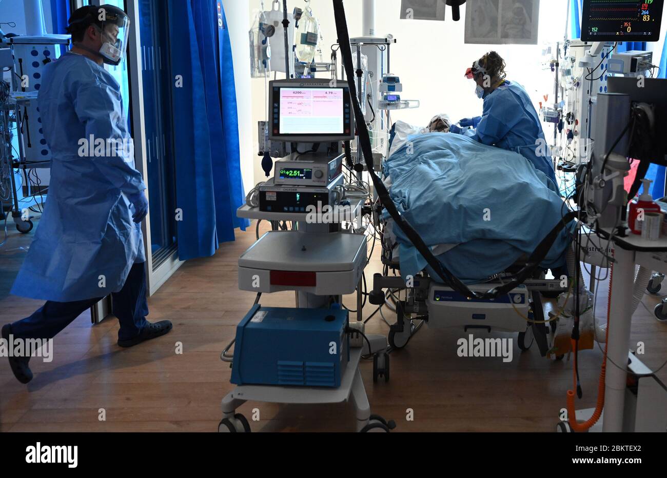 Clinical staff wear Personal Protective Equipment (PPE) as they care ...