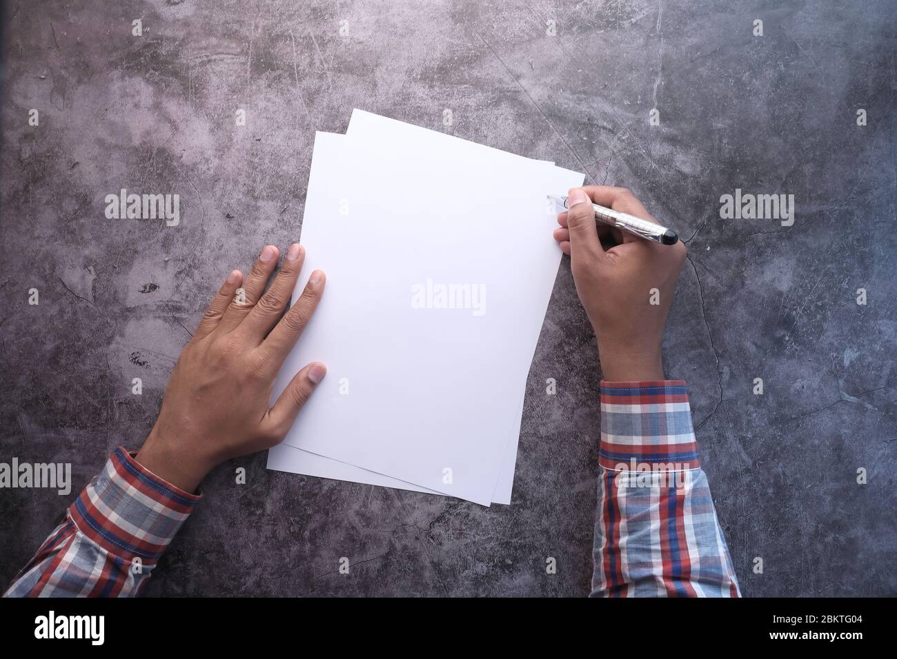 Person writing a letter on paper hi-res stock photography and images ...