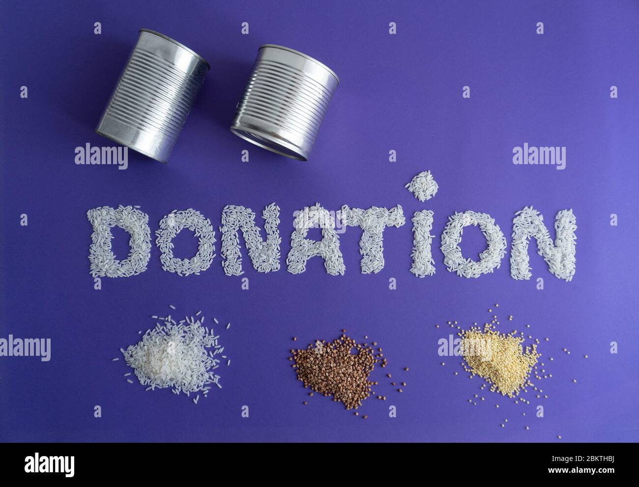 Word donation made from white rice, piles of rice, buckwheat and millet ...