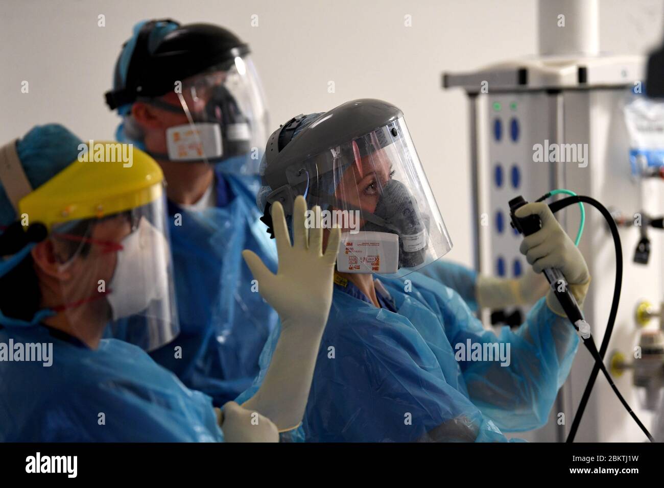 Clinical staff wear Personal Protective Equipment (PPE) as they care ...