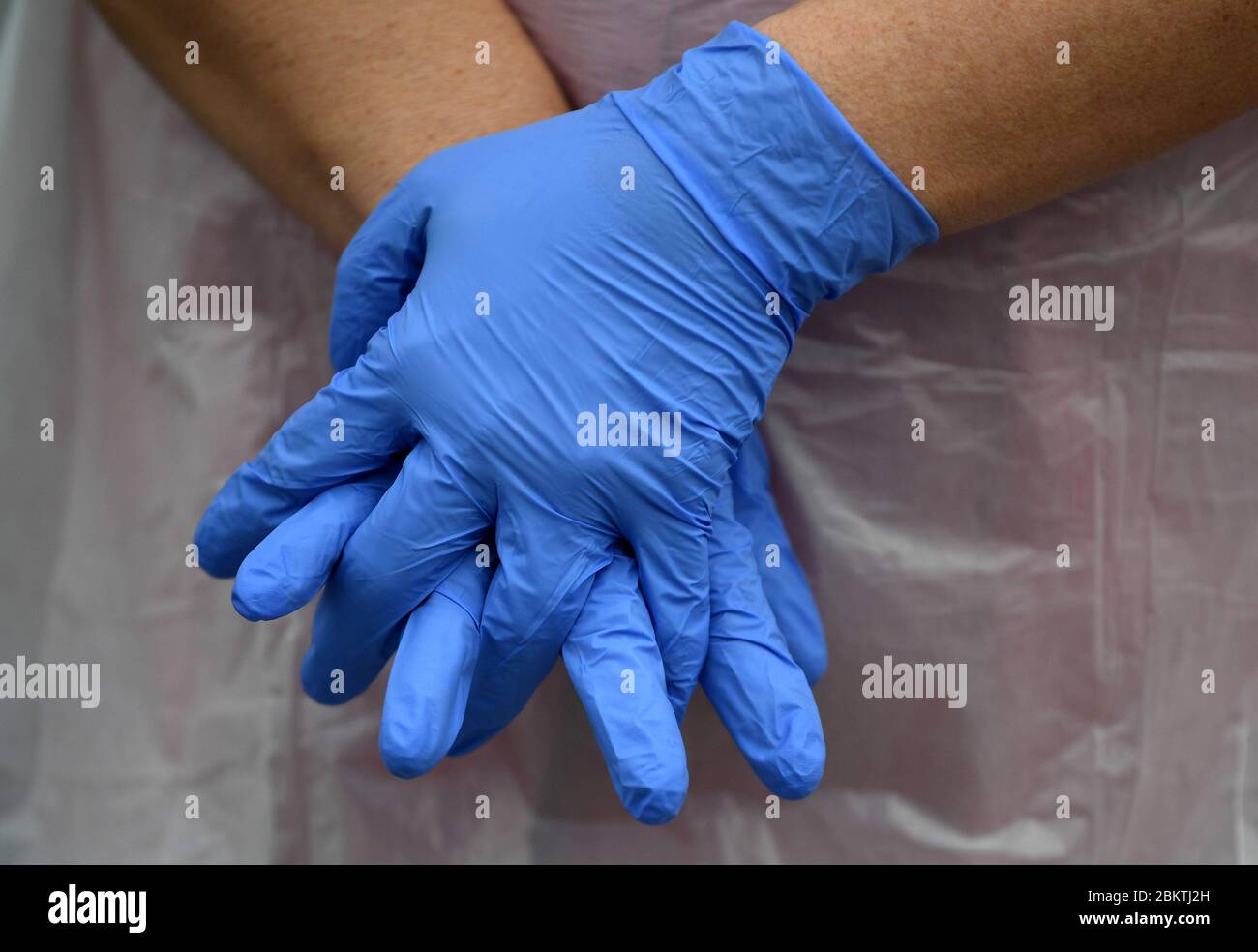 Clinical staff wear Personal Protective Equipment (PPE) as they care ...