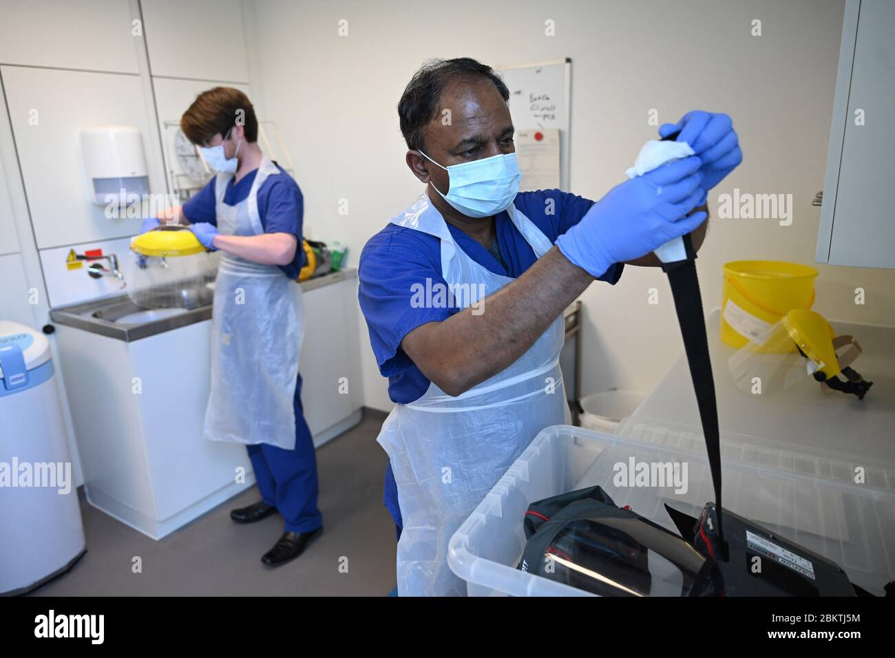 Clinical staff clean Personal Protective Equipment (PPE) at the Royal ...