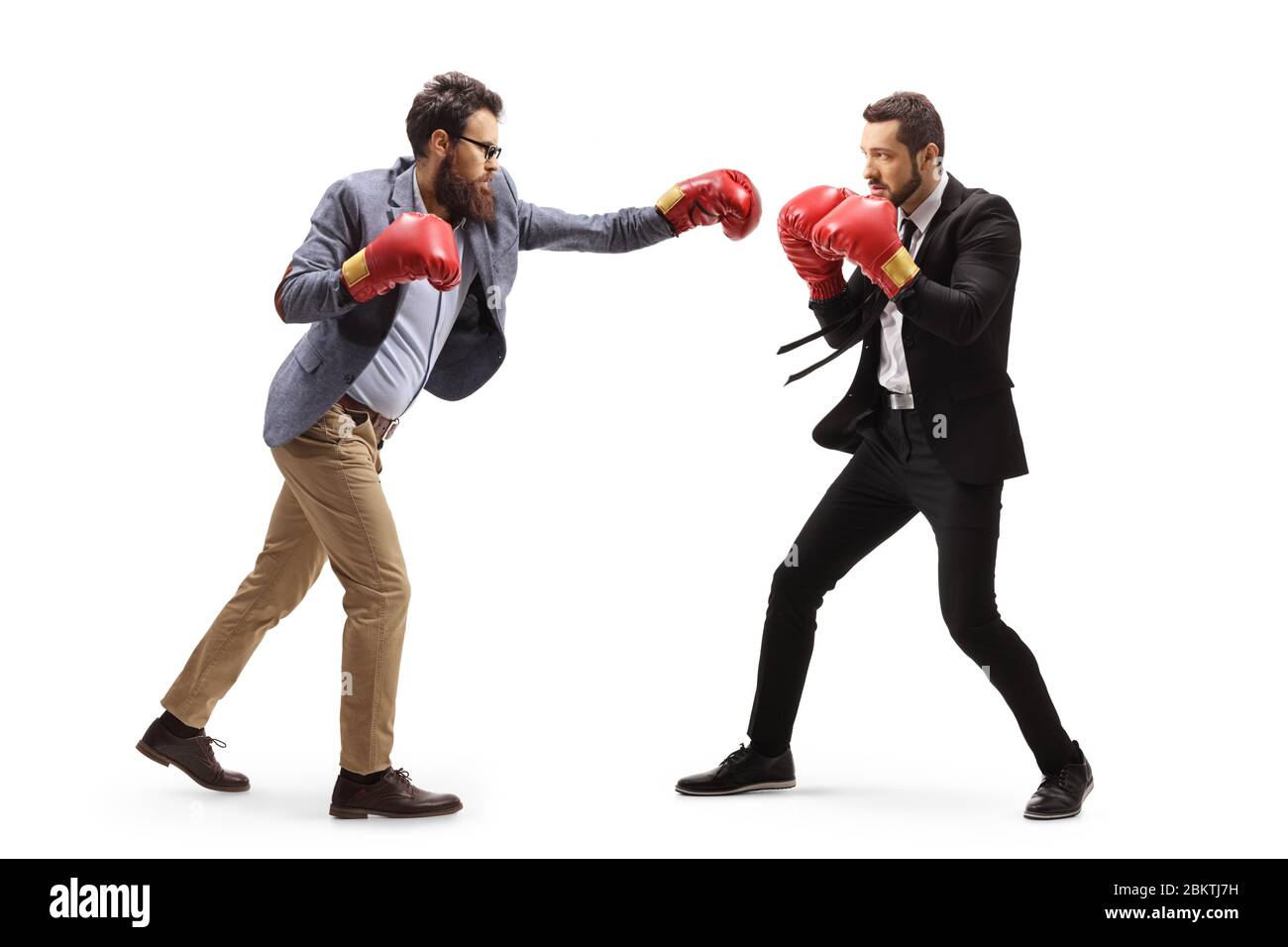 Full length shot of a two men in formal clothes having a fight with ...