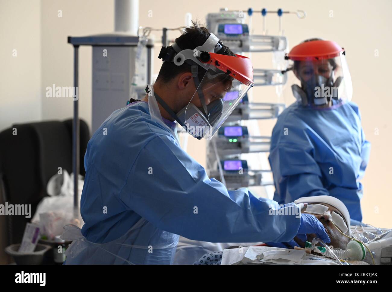 Clinical staff wear Personal Protective Equipment (PPE) as they care ...