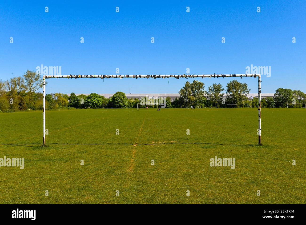 Goalposts and empty pitches on Hackney Marshes during the UK lockdown ...