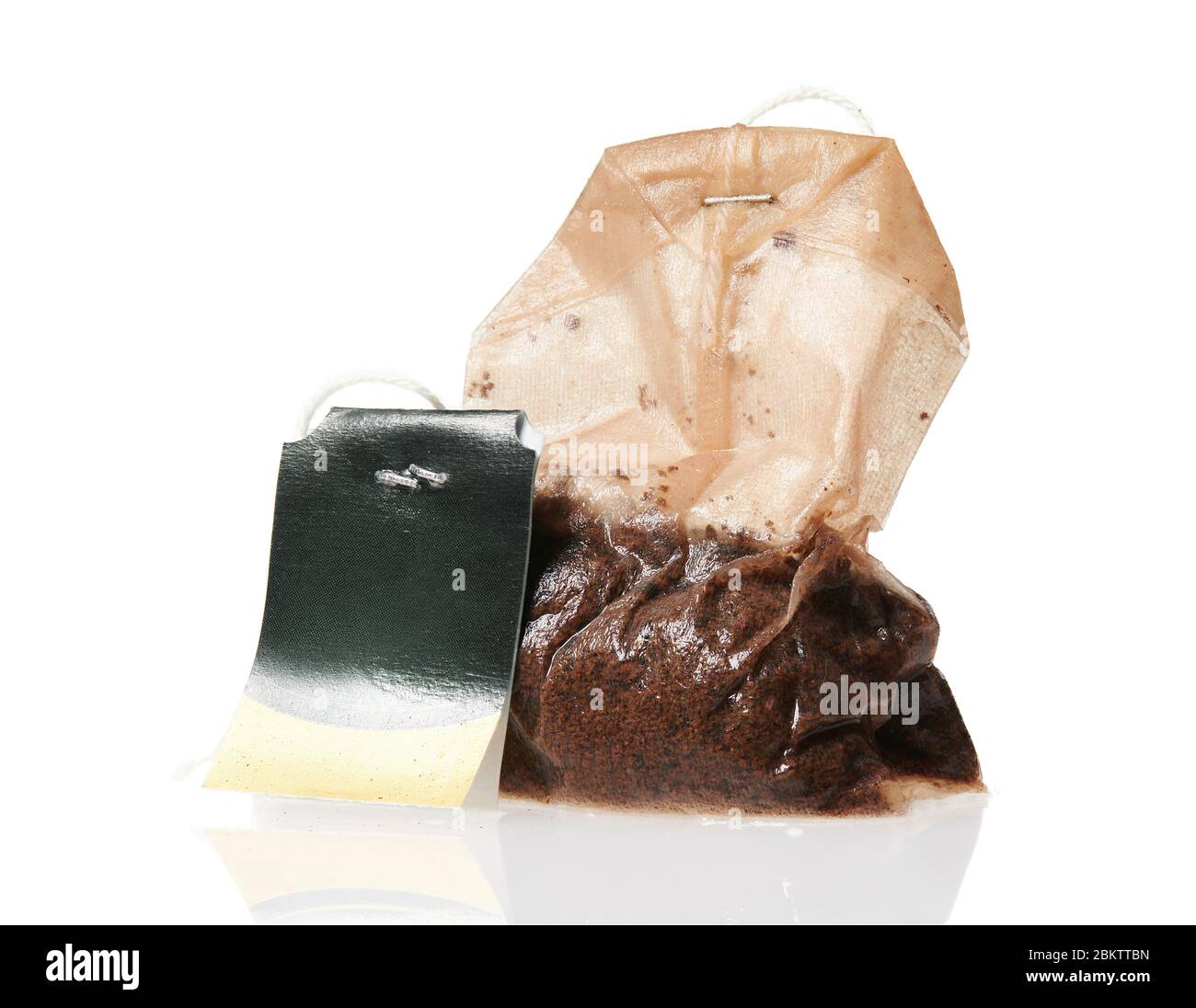 one used tea bag, macro photo high detailed, isolated object on a white ...