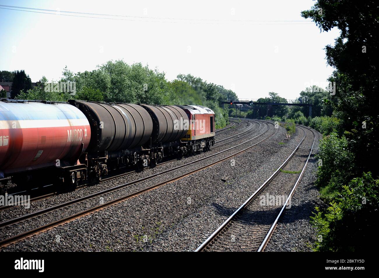 60063 heads a Robeston - Westerleigh (Murco) train along the main line ...