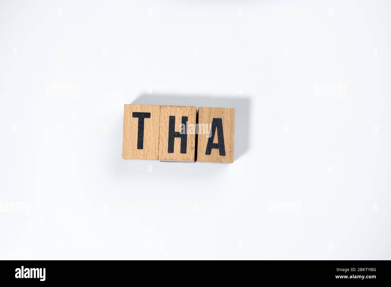 " THA " text made of wooden cube on White background Stock Photo - Alamy