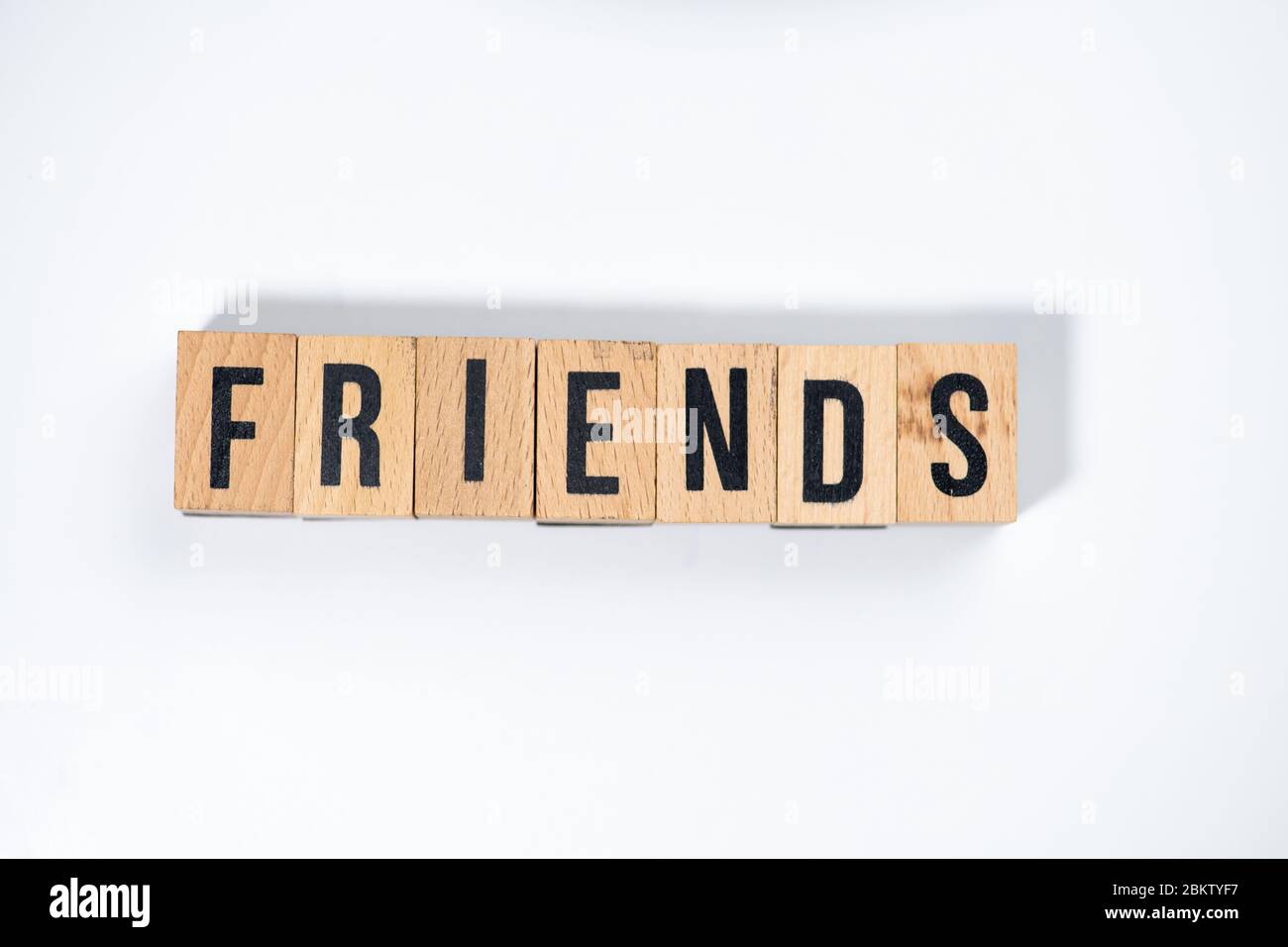 " FRIENDS " text made of wooden cube on White background Stock Photo ...