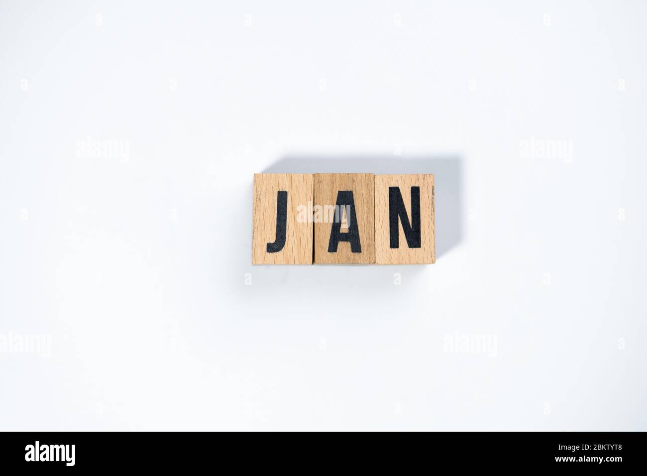 " JAN " text made of wooden cube on White background Stock Photo - Alamy
