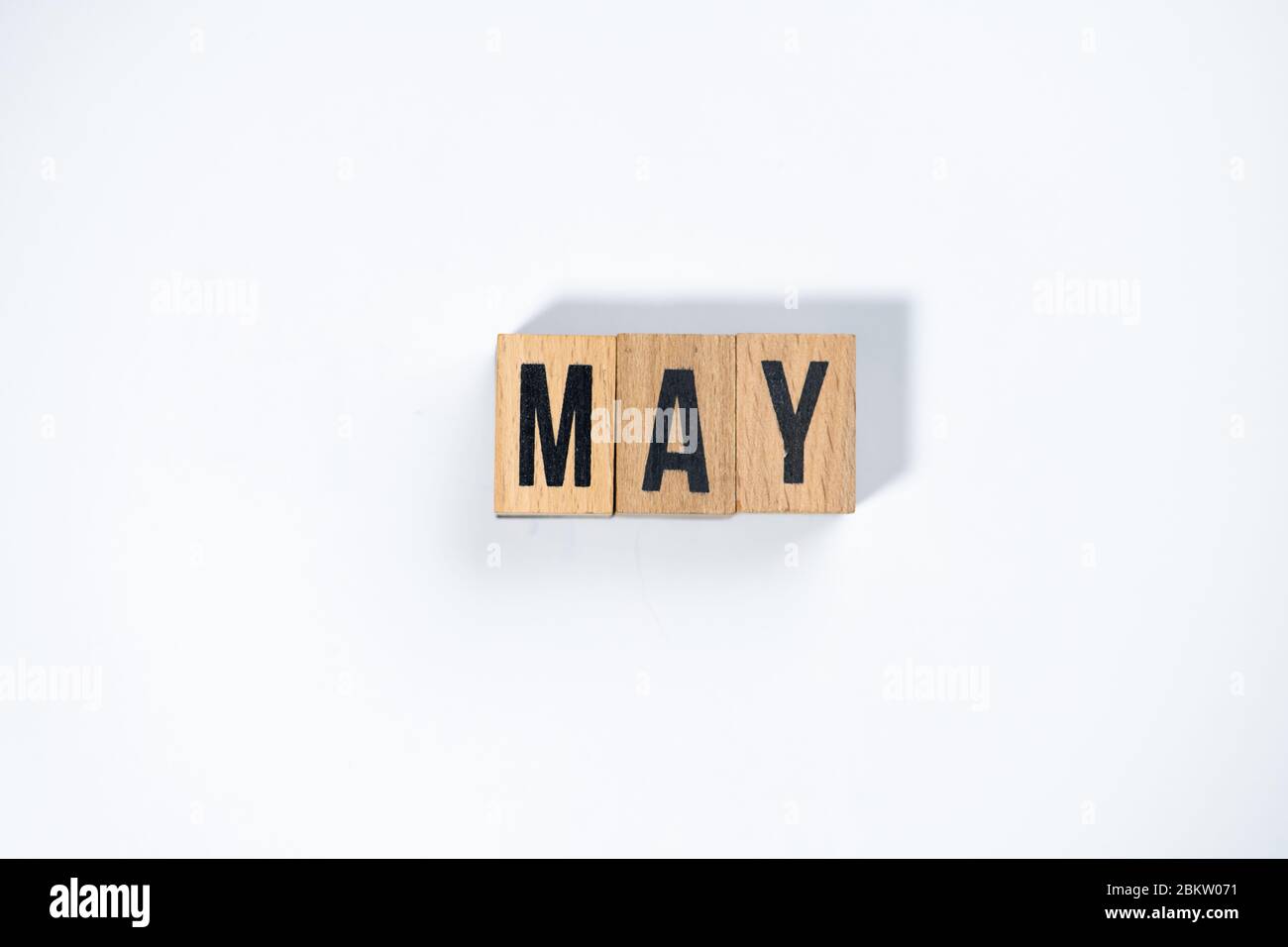" MAY " text made of wooden cube on White background Stock Photo - Alamy
