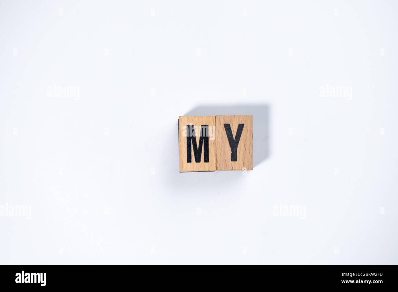 " MY " text made of wooden cube on White background Stock Photo - Alamy