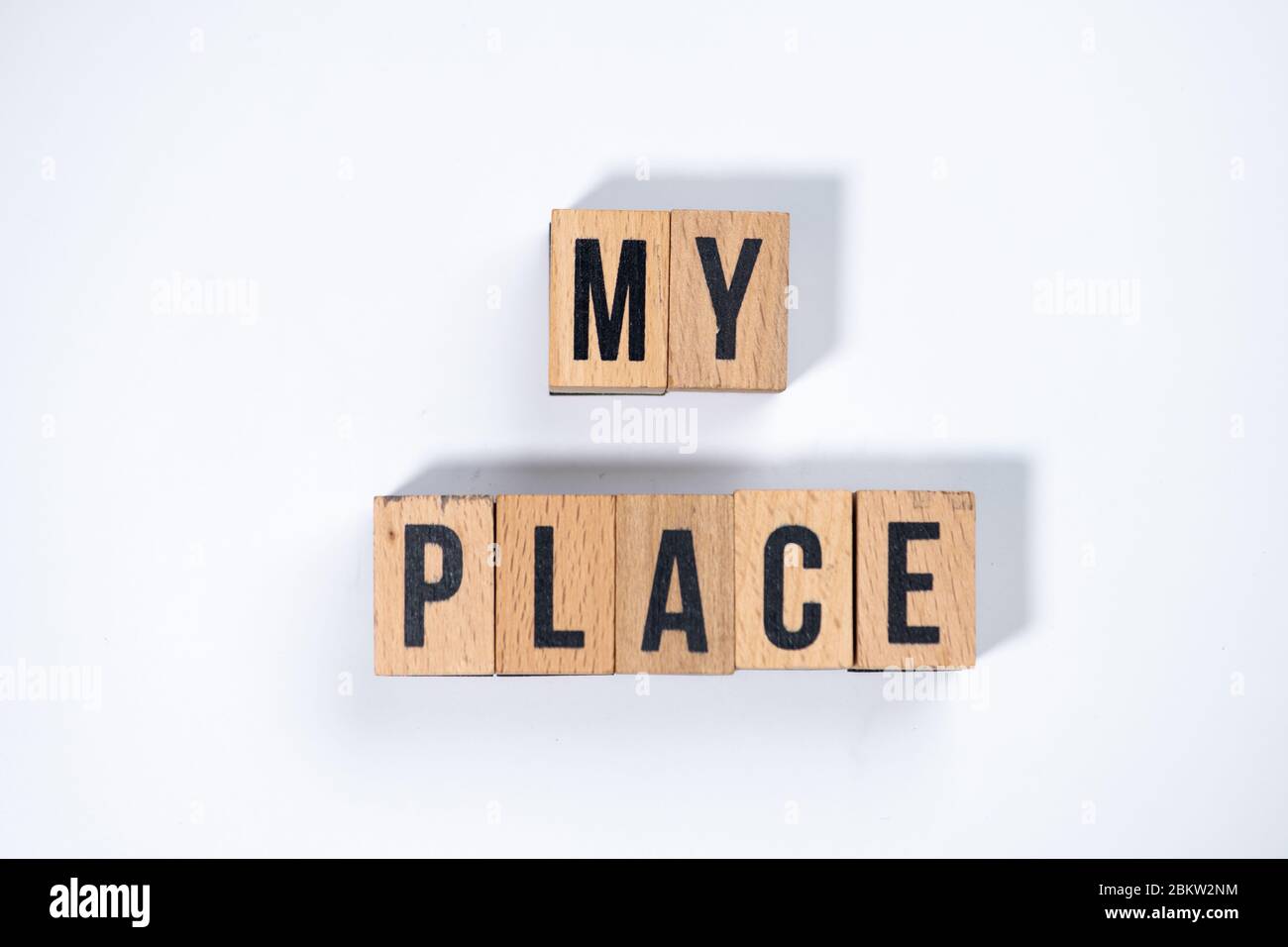 " MY PLACE " text made of wooden cube on White background Stock Photo ...