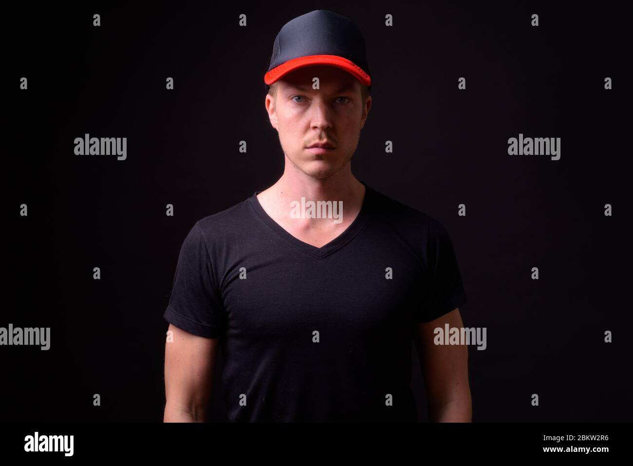 Handsome male wearing black hat hi-res stock photography and images - Alamy