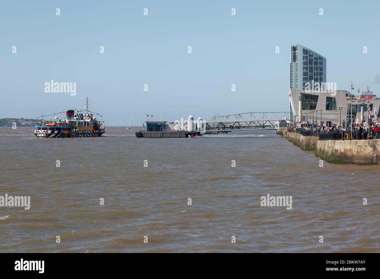 Mersey Ferry approaching the terminal at Liverpool waterfront, with the ...